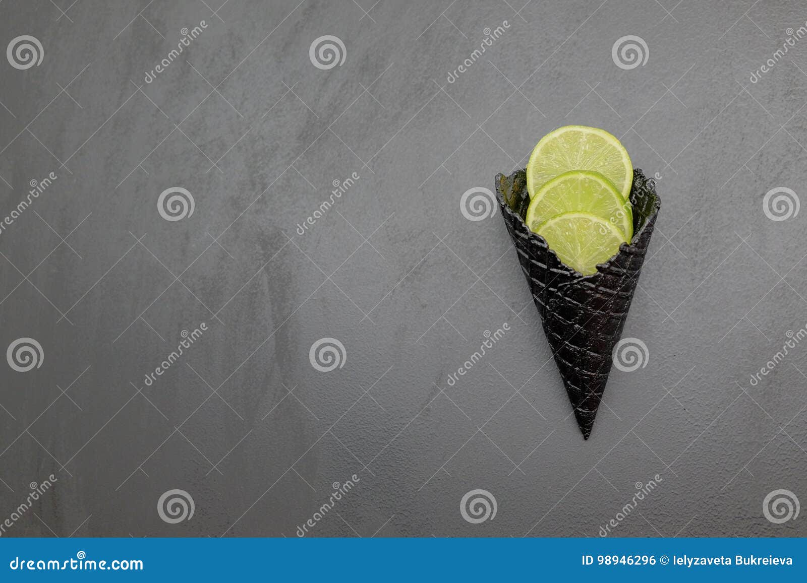 Black Ice Cream Cone with Lime Stock Photo - Image of blackberry, cone ...