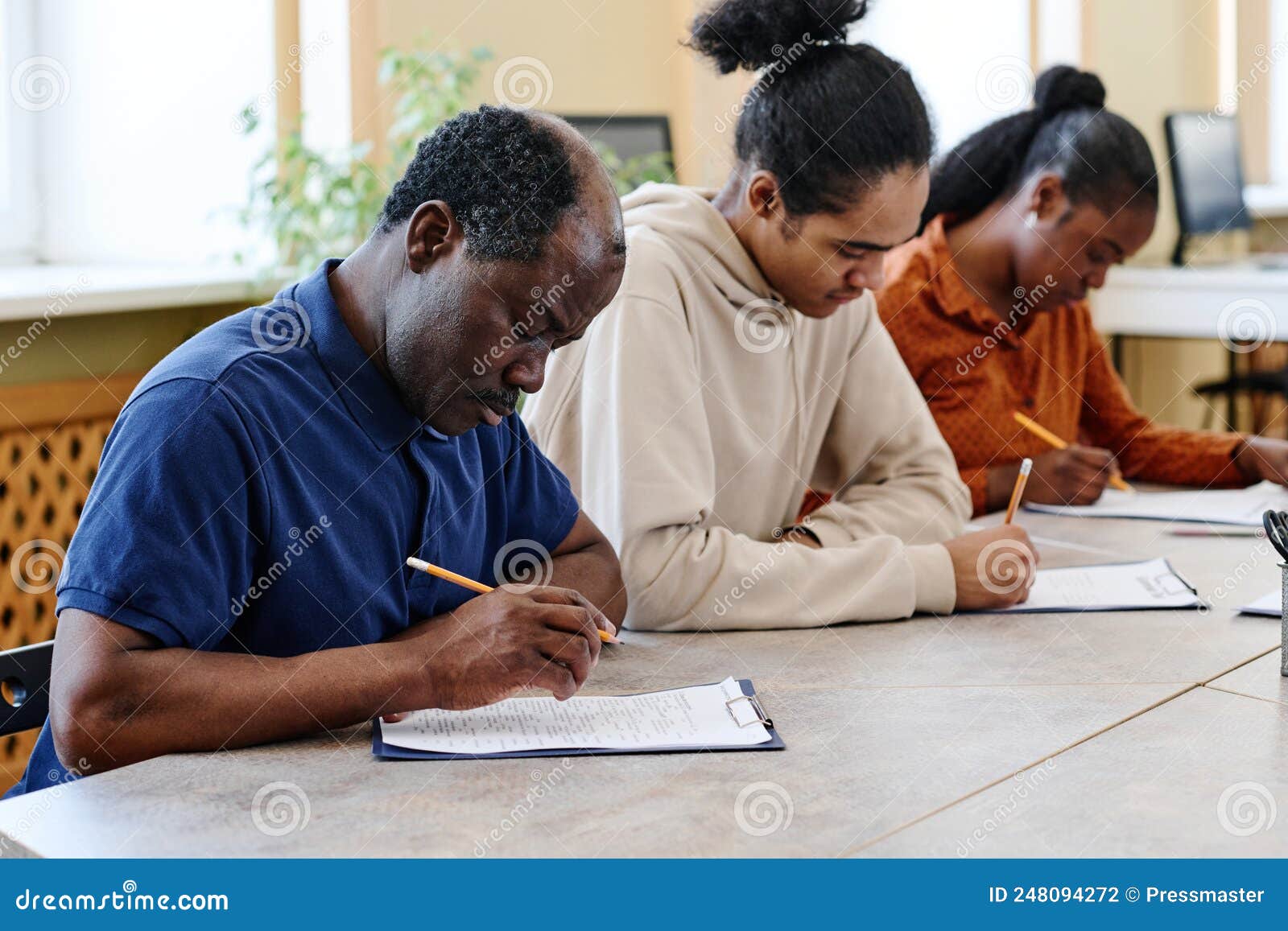 Black Immigrants Doing Language Test Stock Photo - Image of school ...
