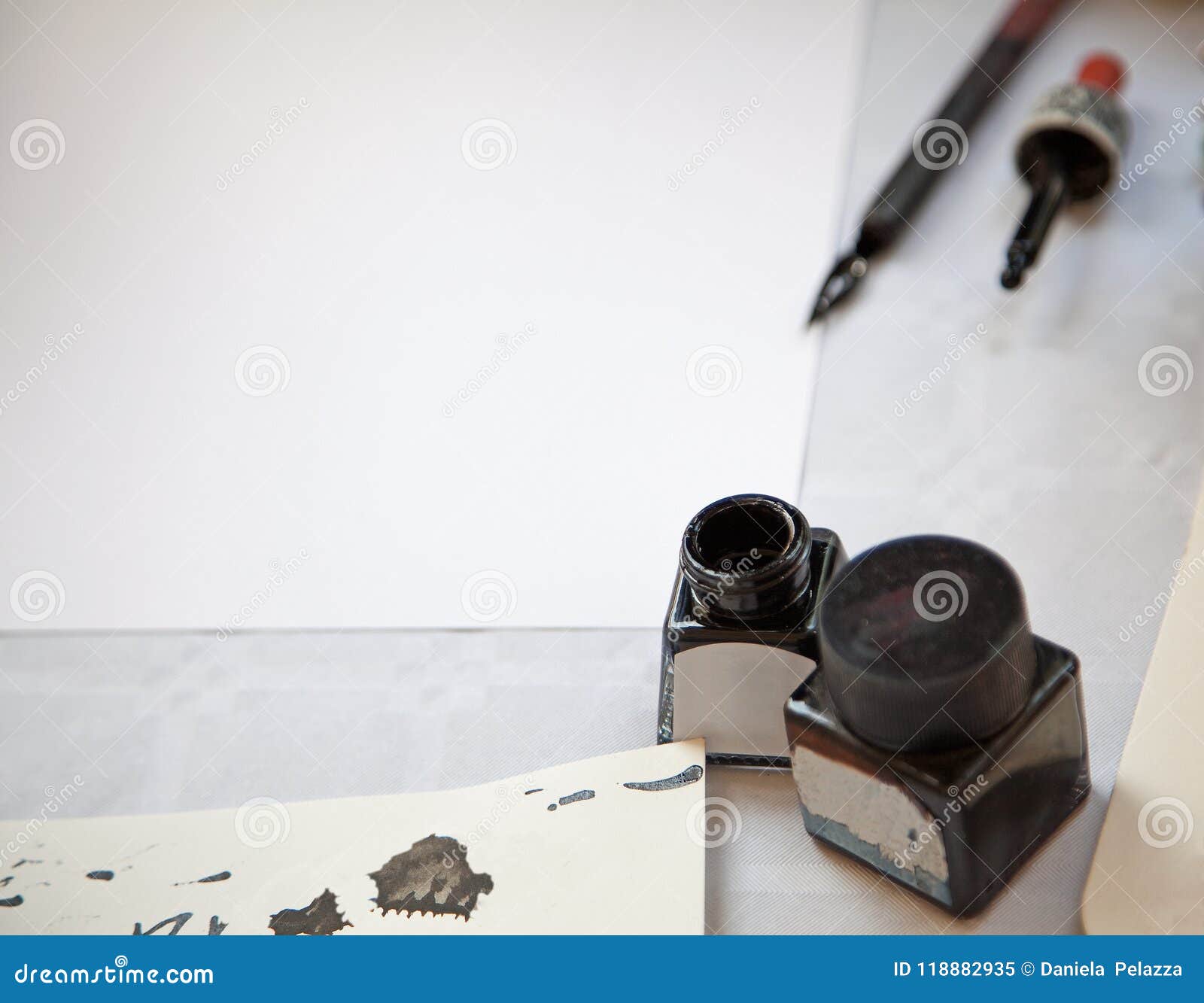 Black ink and papers stock image. Image of creative - 118882935