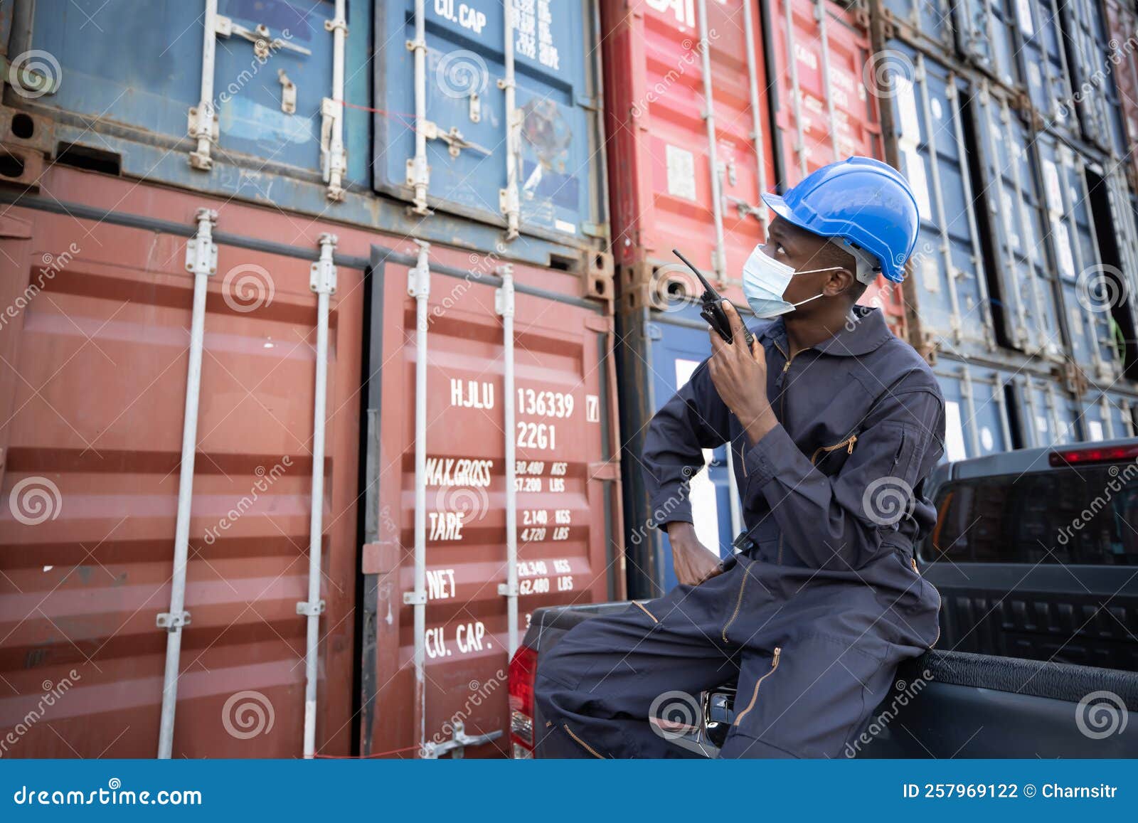 Black Inspector with Inspecting the Containers at the Port Stock Photo ...