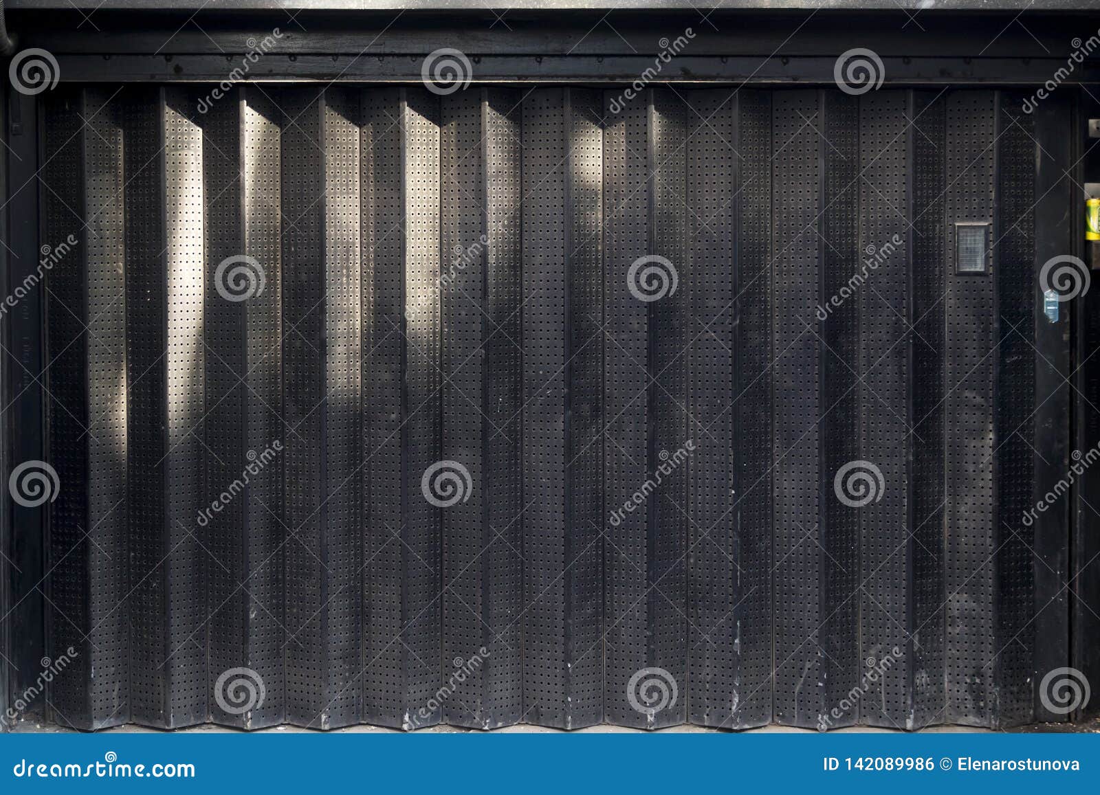 The Black Iron Corrugated Gate. Urban Dark Background, Rolling Shutters ...
