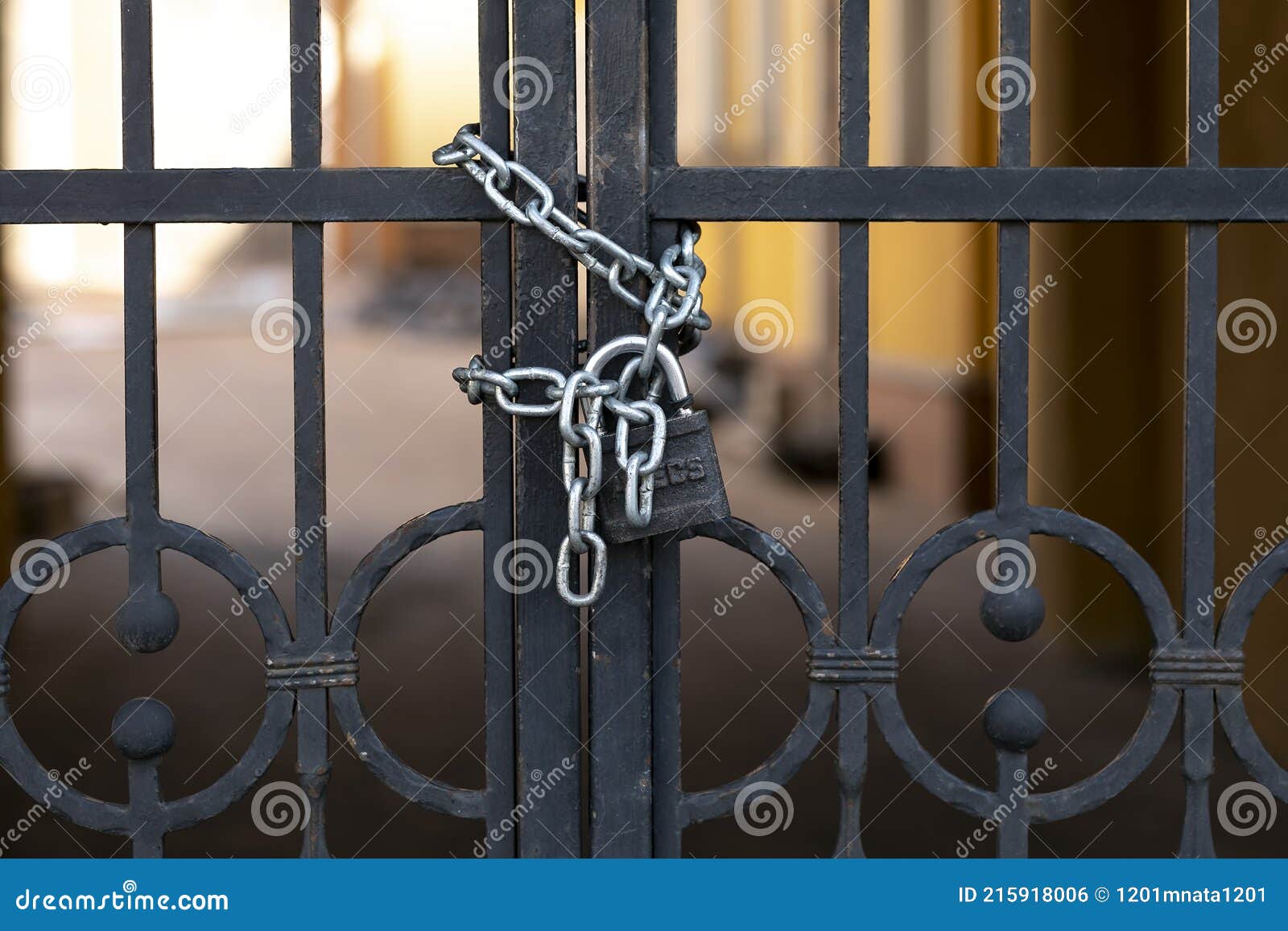 Black Iron Gate with Rust Closed on Padlock with Chains Stock Photo ...