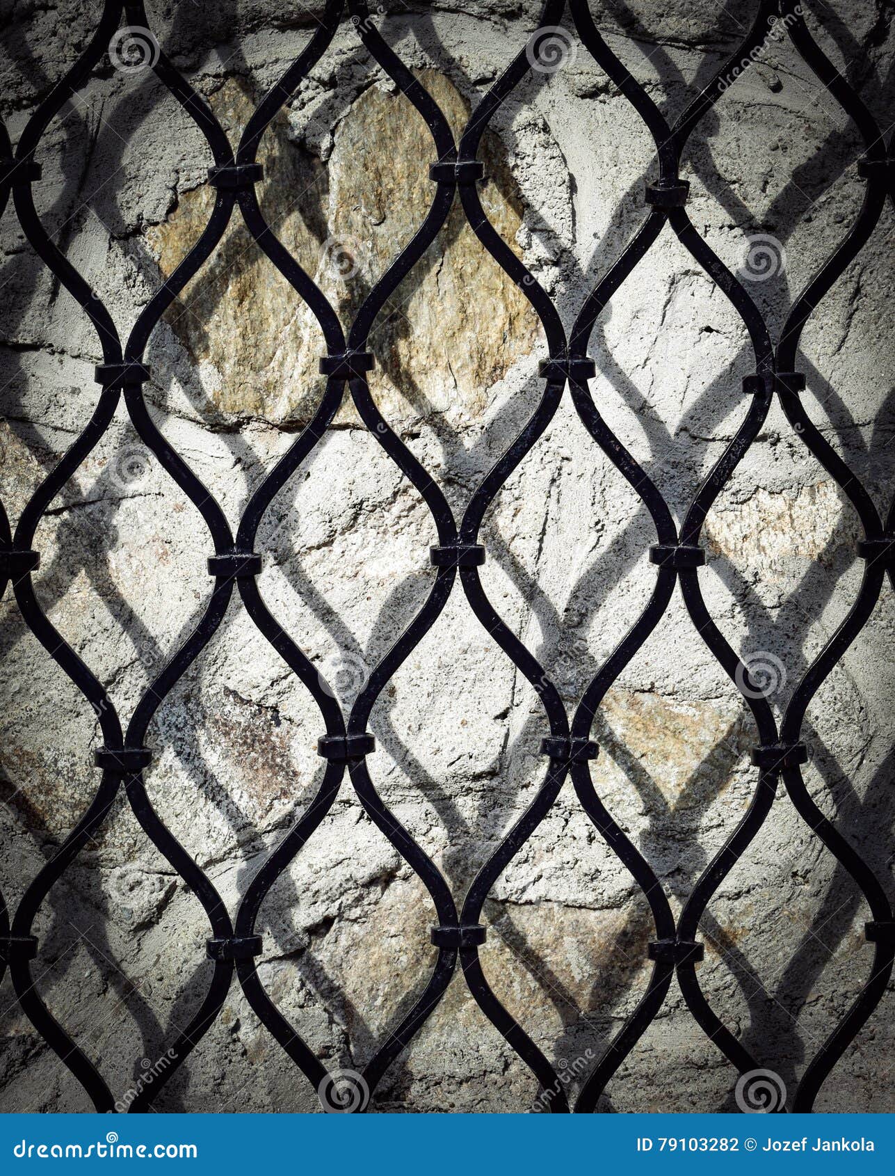 Black Iron Grid on a Stone Wall Stock Photo - Image of pattern, steel ...