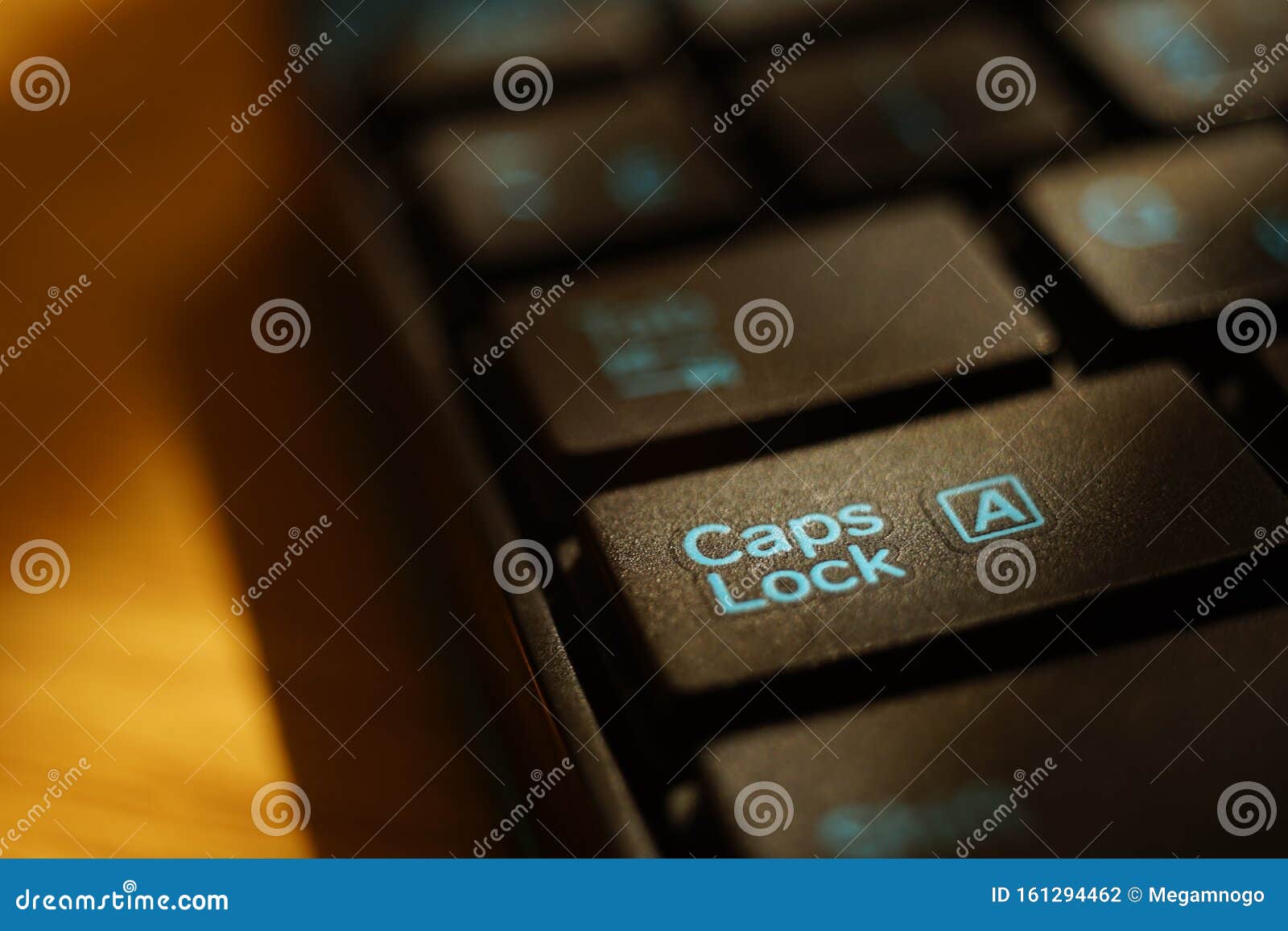 Black Keyboard on the Sunny Table Closeup. Focus on Key Caps Lock Stock ...