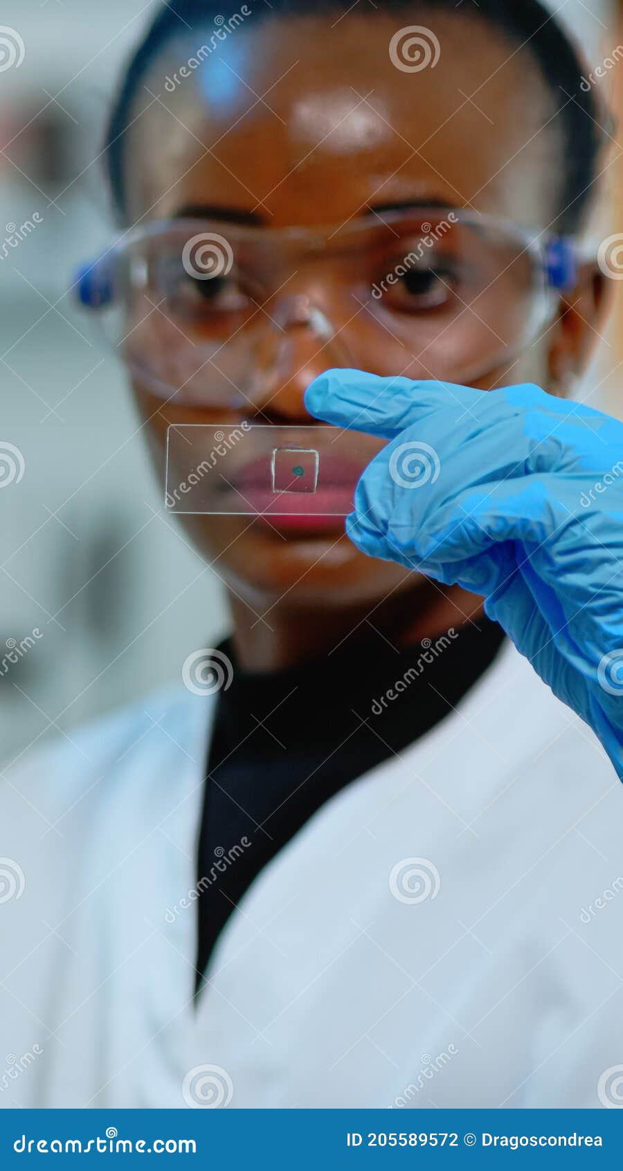 Black Lab Technician Doing Experiment in Lab Looking at Result Stock ...