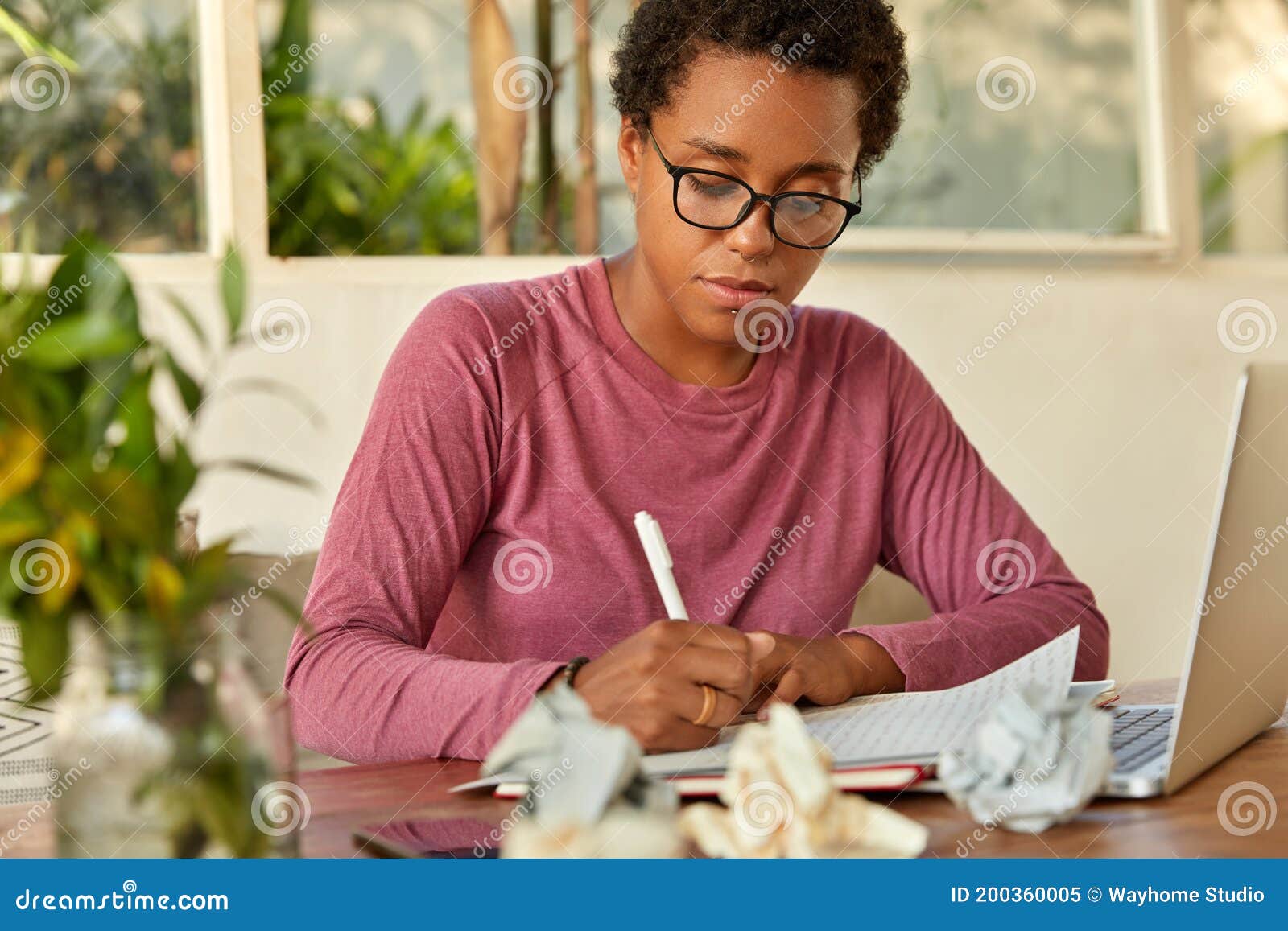 Black Lady Creats Publication, Writes Records in Notepad, Focused on ...