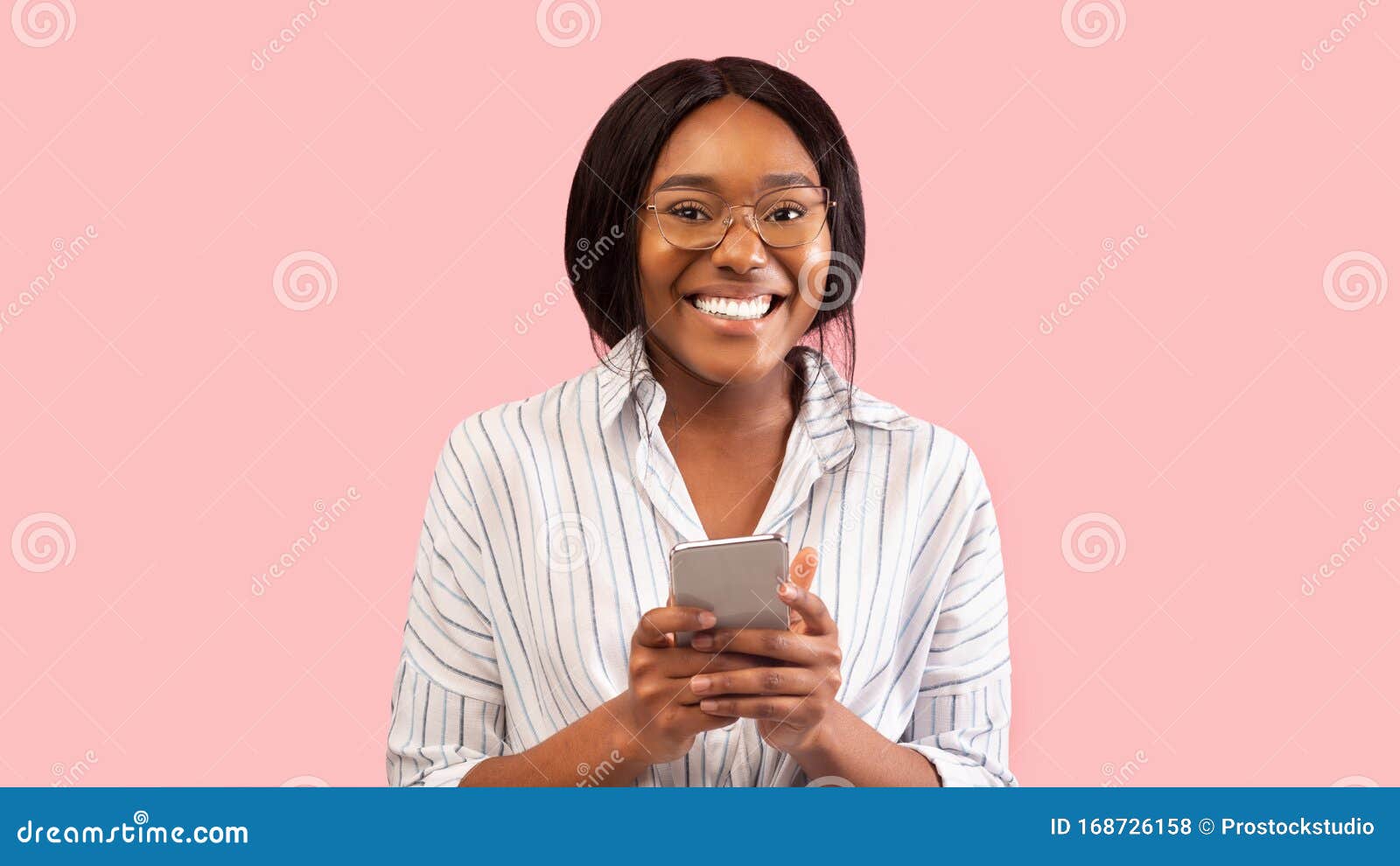 Black Lady Using Mobile Phone Standing on Pink Background, Panorama ...