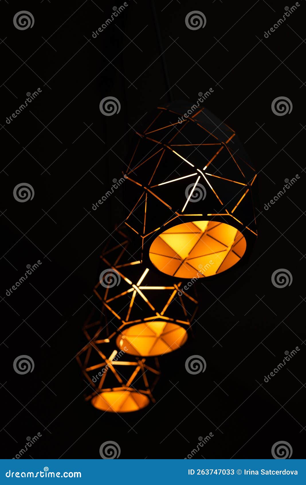 Black Lamps with a Geometric Pattern, Three Lamps on a Black Background ...