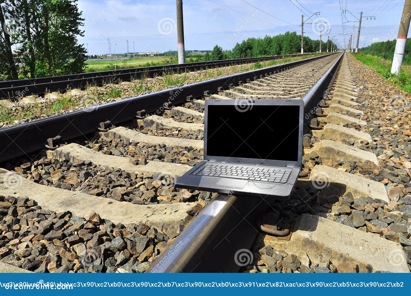 Black Laptop on Railway Tracks. Railway Tracks Going into the Distance ...