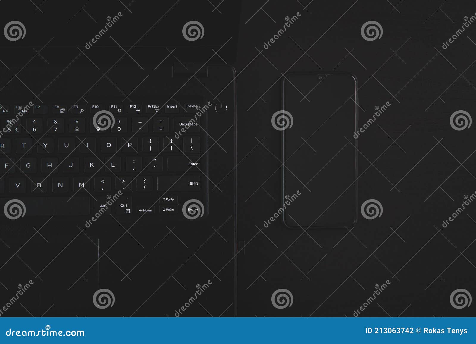 Black Laptop and Black Smartphone on Black Table. Dark Theme Stock ...