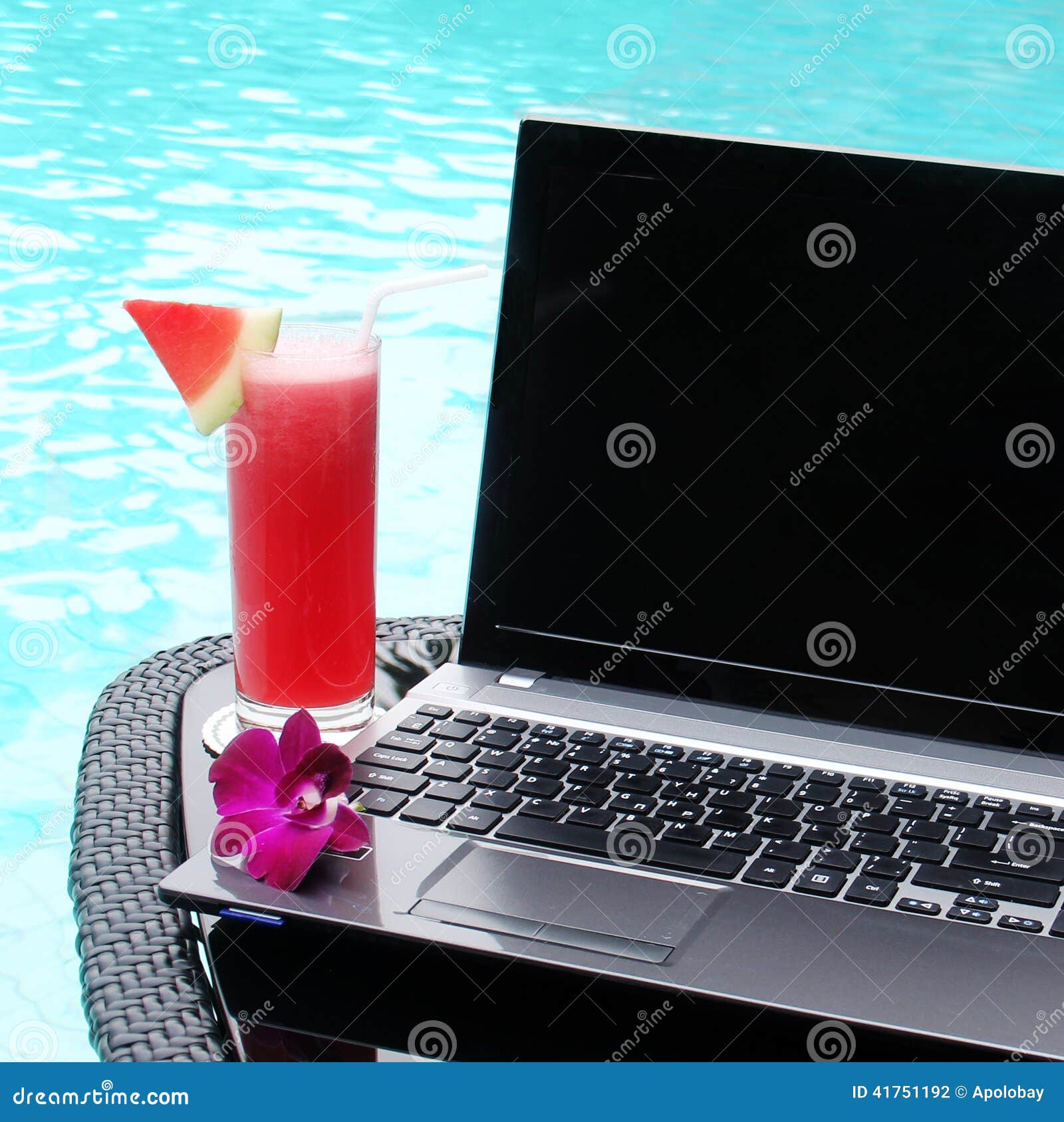 Black Laptop and Watermelon Juice Poolside Stock Photo - Image of ...