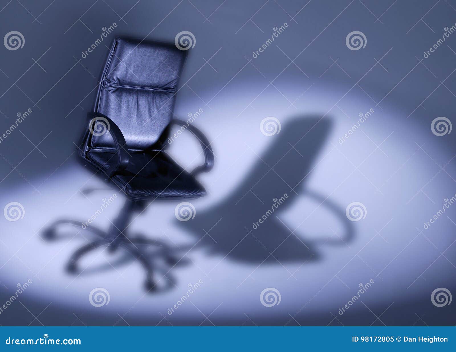 Black Leather Office Chair in Spotlight Stock Image - Image of chair ...