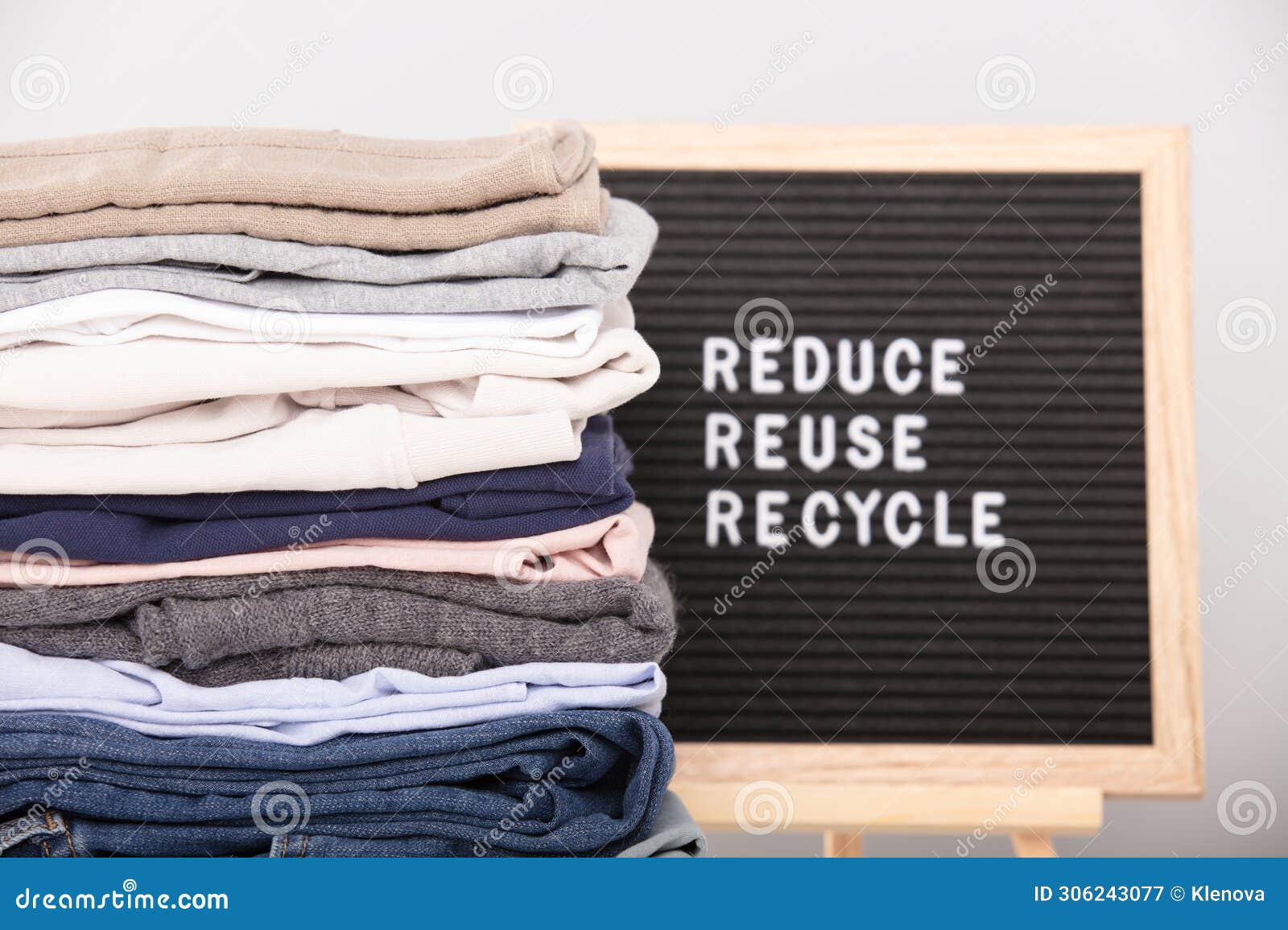 Black Letter Box and Stack of Folded Clothes, Reduce,reuse,recycle ...