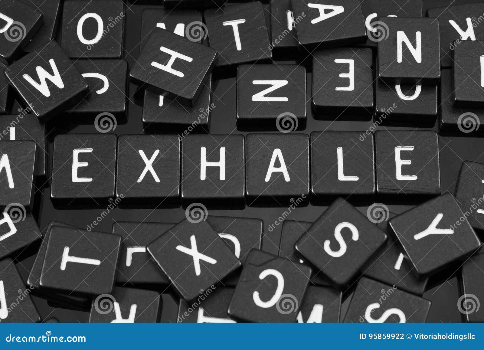 Black Letter Tiles Spelling the Word & X22;exhale& X22; Stock Photo ...