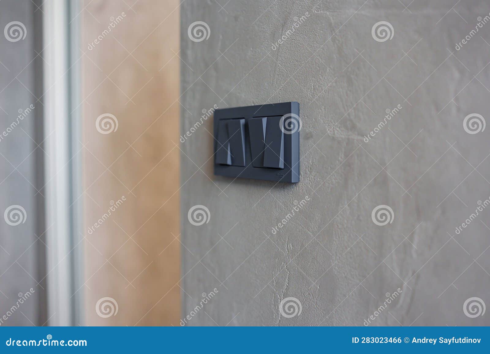 Black Light Switch Keys on a Gray Wall. Stock Photo - Image of object ...