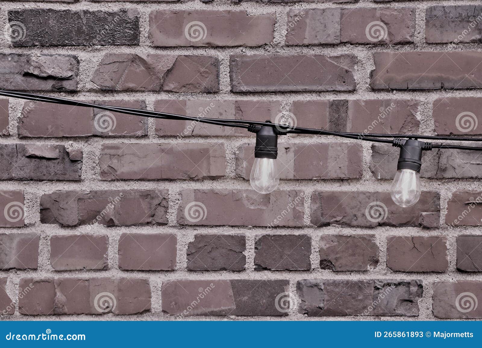 Black Lightbulb String on Muted Red Brick, Horizontal Stock Image ...