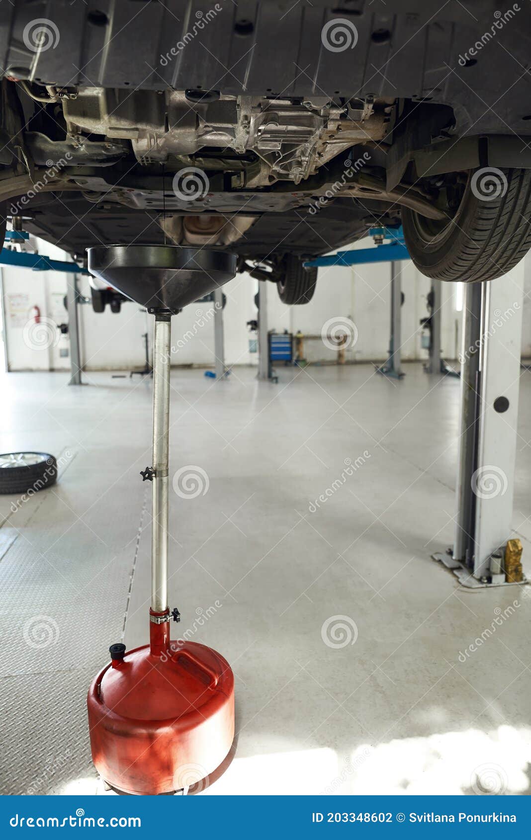 Black Liquid Dripping from Machine Bottom Installed on Lift Stock Photo ...