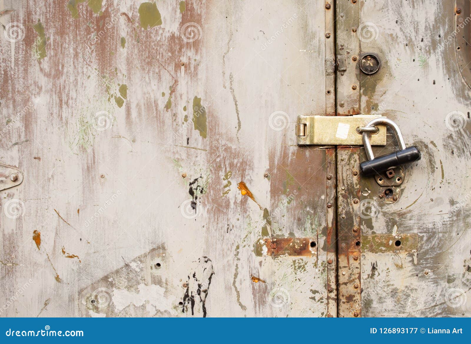 Big Black Lock Hanging on a Painted Iron Ragged Door Stock Image ...
