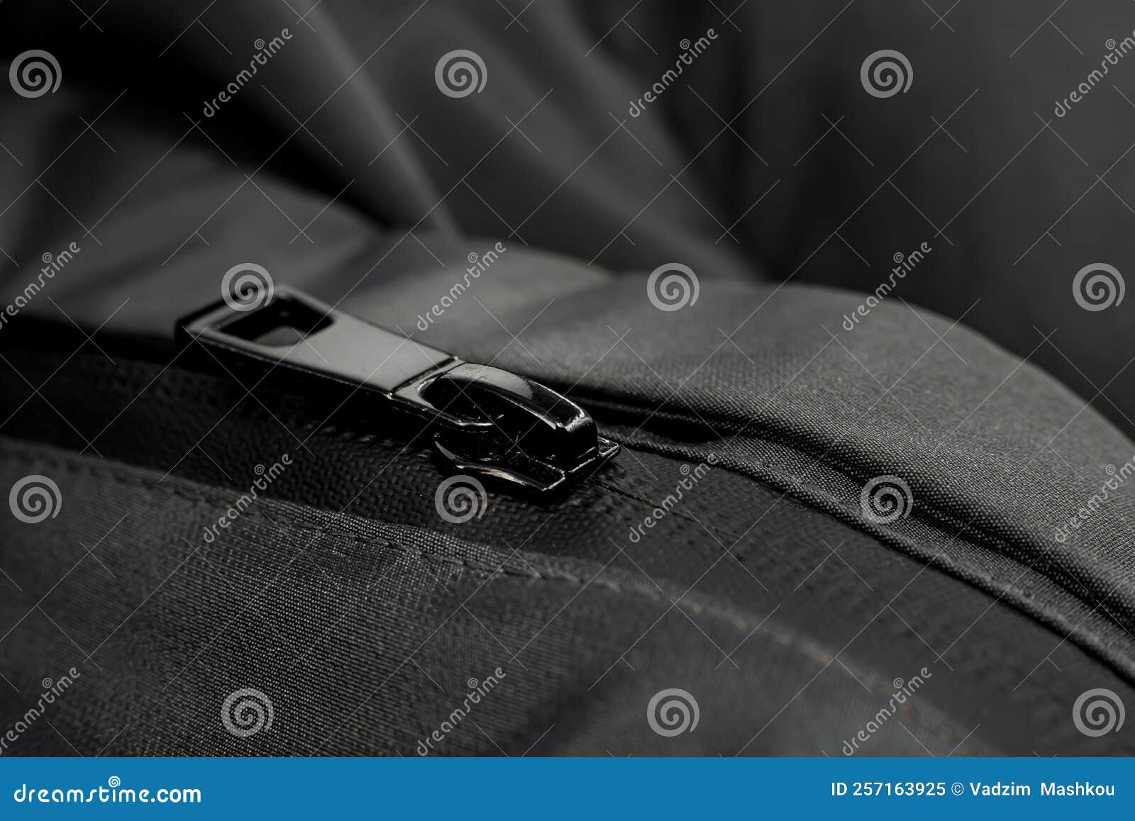 Black Lock with a Zipper on Clothes Close-up. Lock Stock Image - Image ...