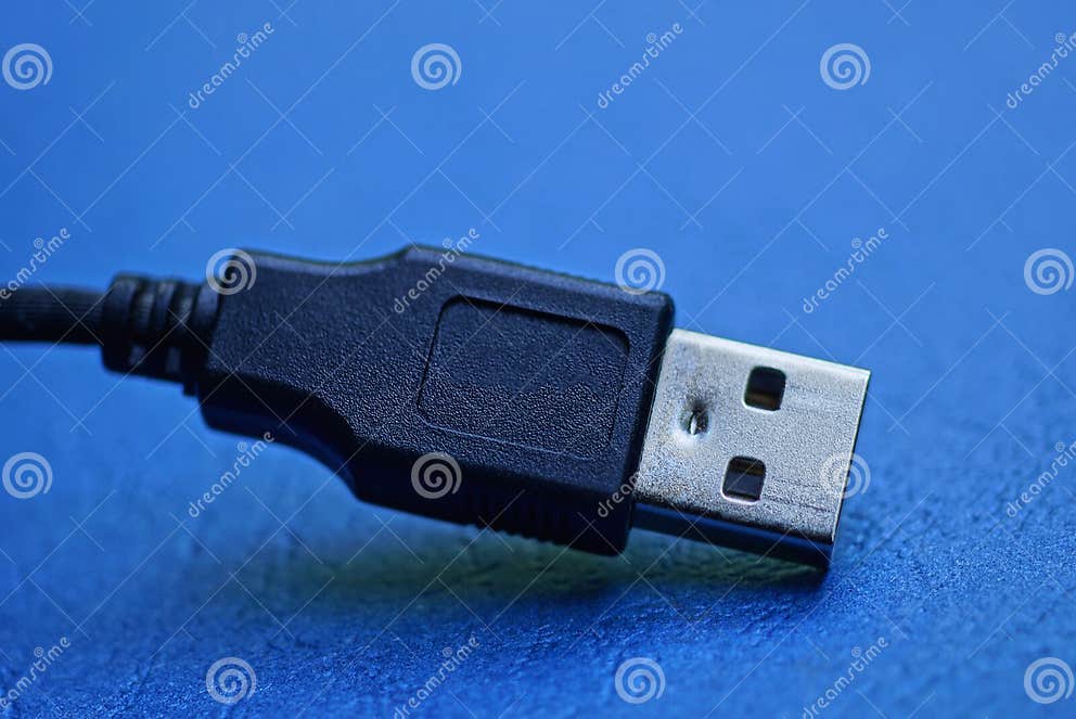 Long Usb Cord with Plug on a Blue Table Stock Image - Image of cutout ...