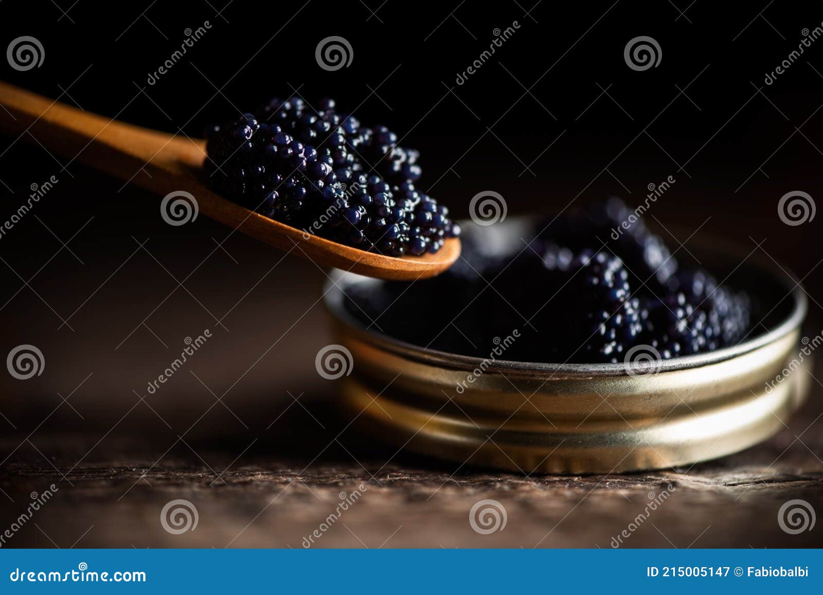 Black Lumpfish Caviar in a Small Pot and Spoon Stock Image - Image of ...