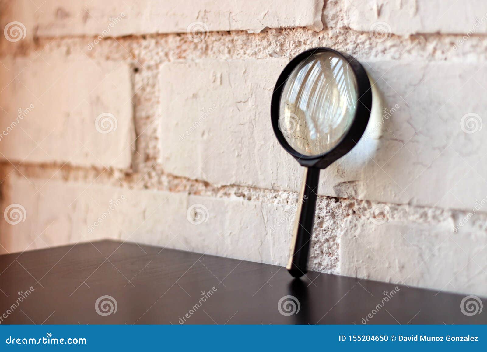 Magnifying Glass on a White Wall. Stock Photo - Image of medicinal ...