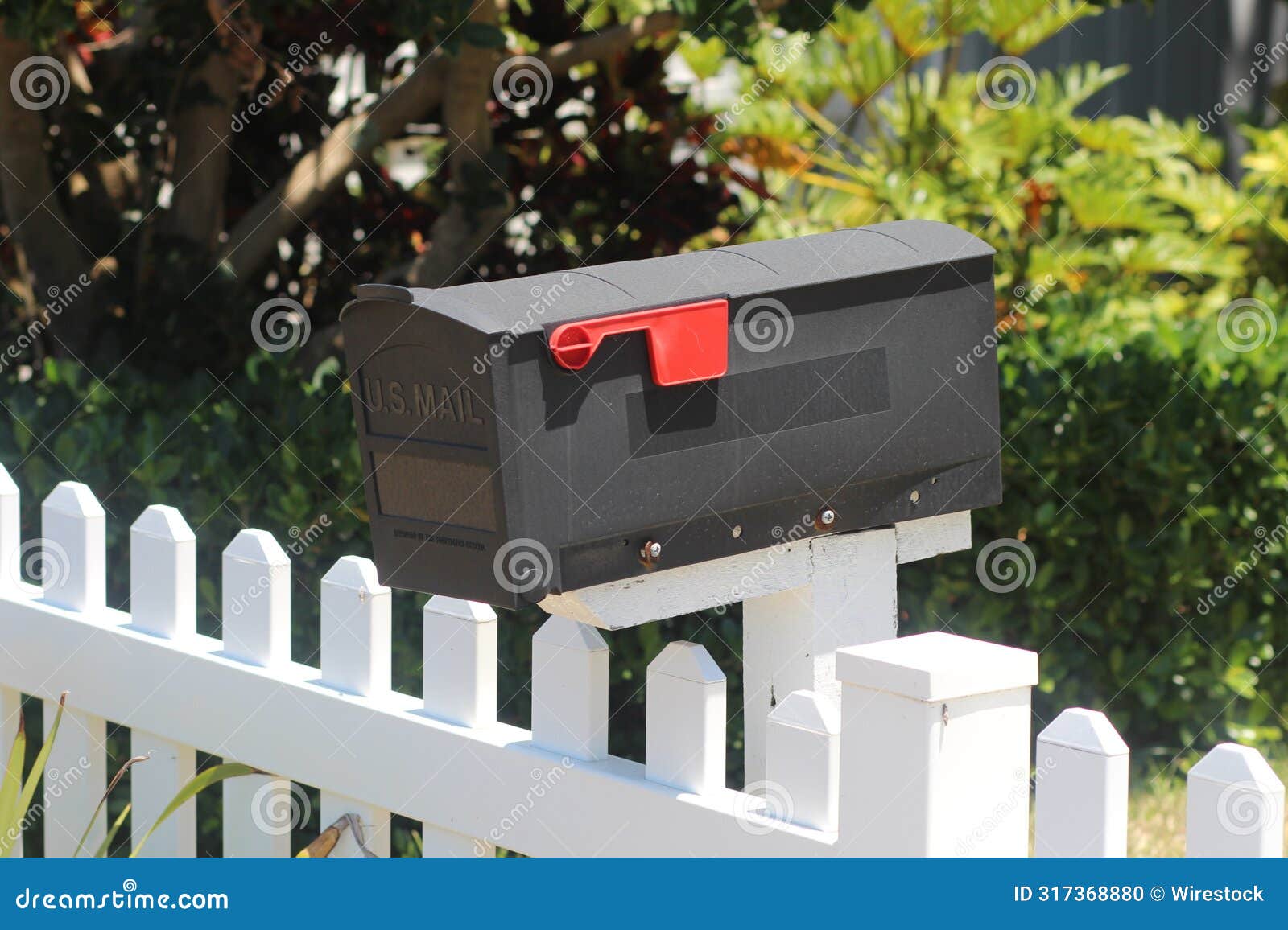 Black Mailbox on a White Picket Fence Stock Photo - Image of ...