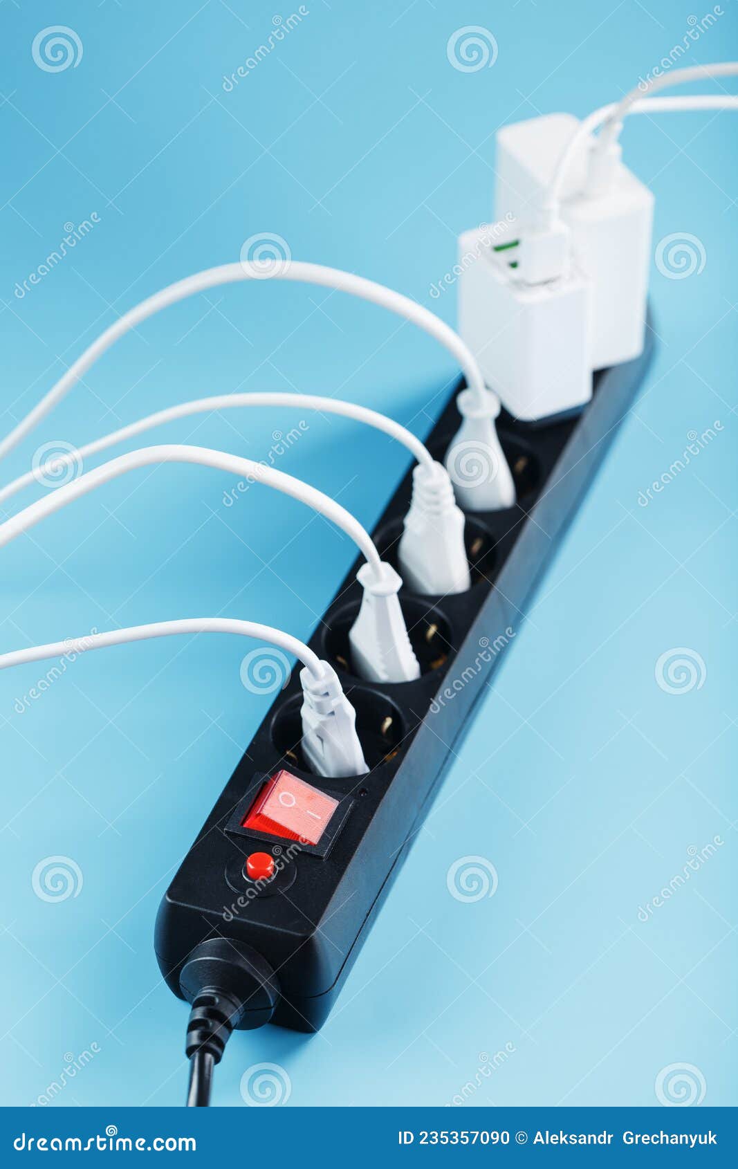 A Black Mains Filter with Electrical Outlets Inserted into it with ...