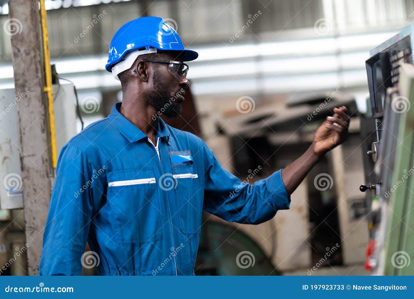 Black Male Engineer Working on Machine in Factory. Black Man Engineer ...