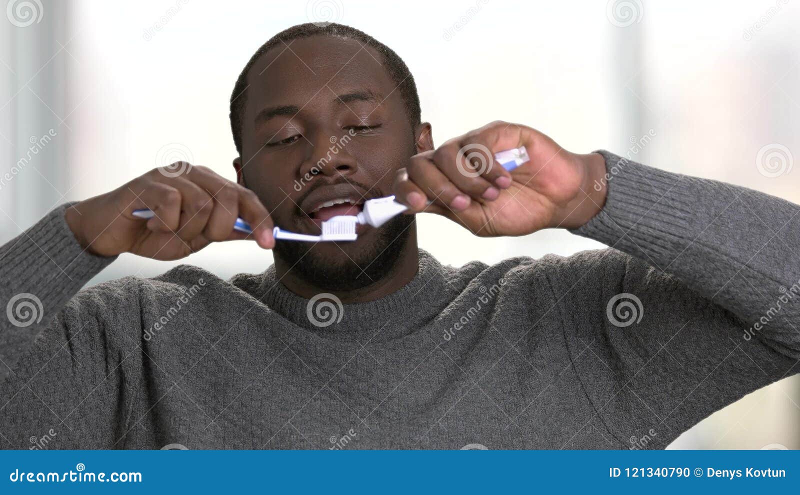 Black Man Applying Toothpaste on a Toothbrush. Stock Footage - Video of ...