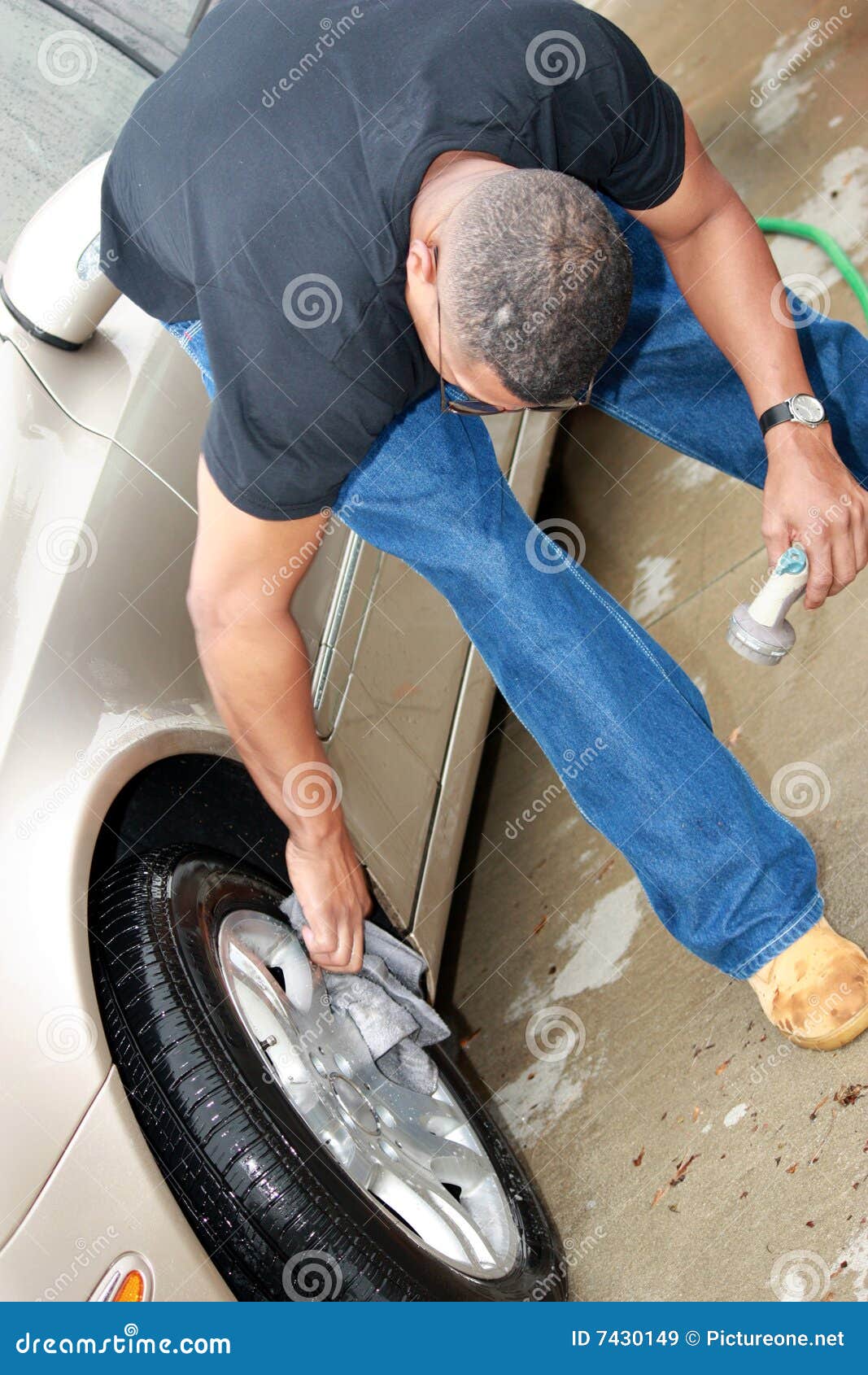 Black man cleaning car 2 stock image. Image of bending - 7430149