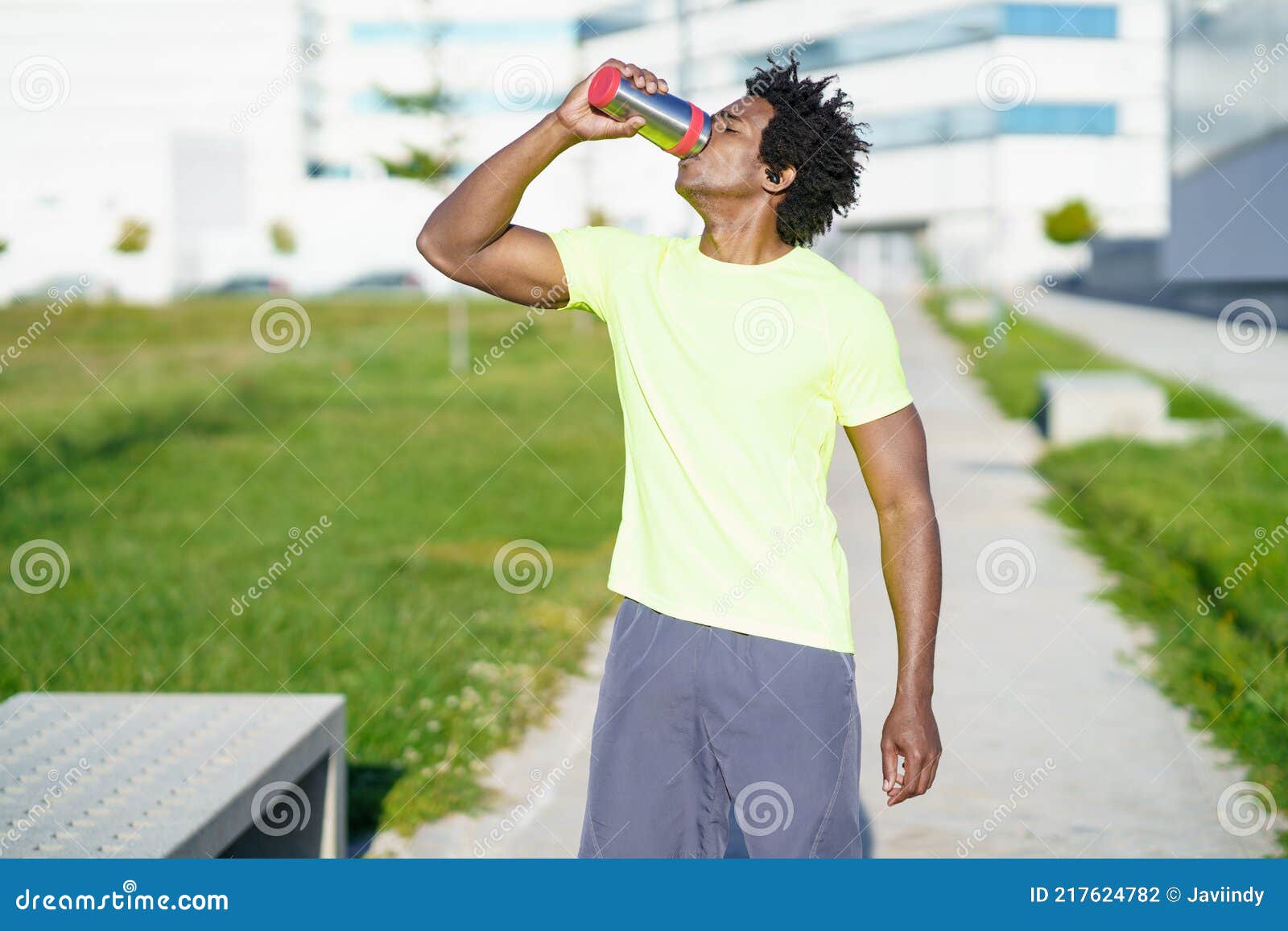 Black Man Drinking during Exercise. Runner Taking a Hydration Break ...