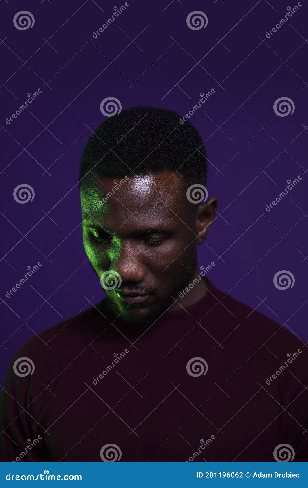 Black Man with Head Bowed stock photo. Image of person - 201196062