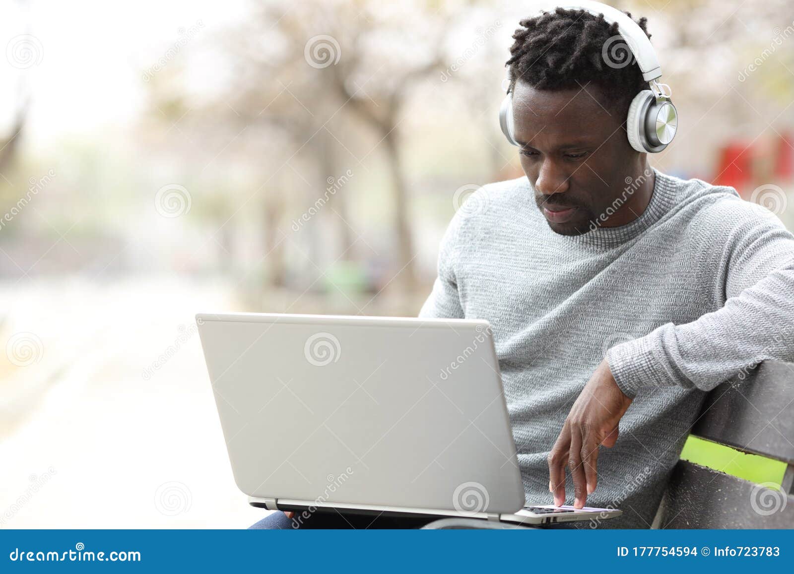 Black Man with Headphones E-learning Using Laptop Stock Photo - Image ...