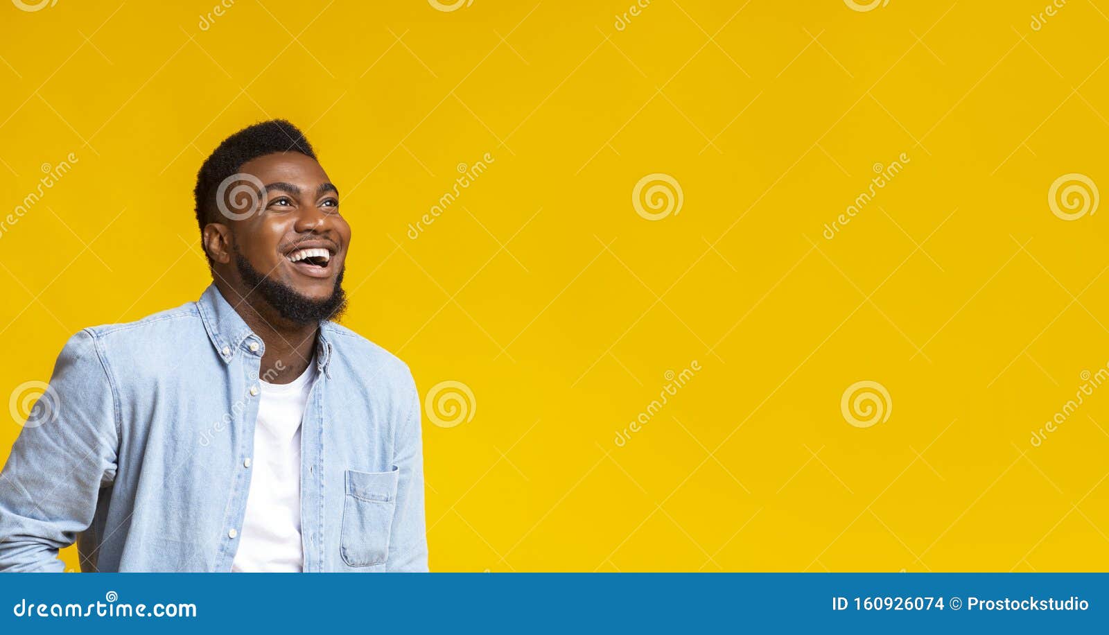 Black Man Looking at Copy Space with Ecstatic Face Expression Stock ...
