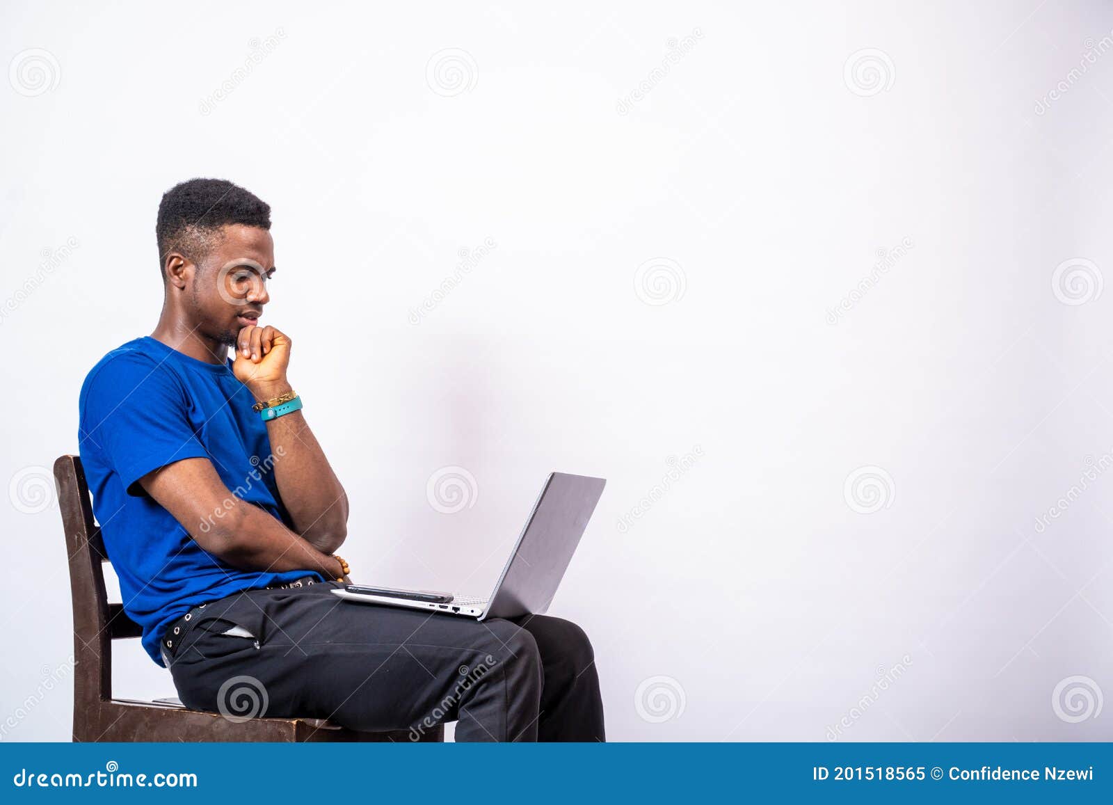 Black Man Looking Puzzled while Using His Laptop Stock Image - Image of ...
