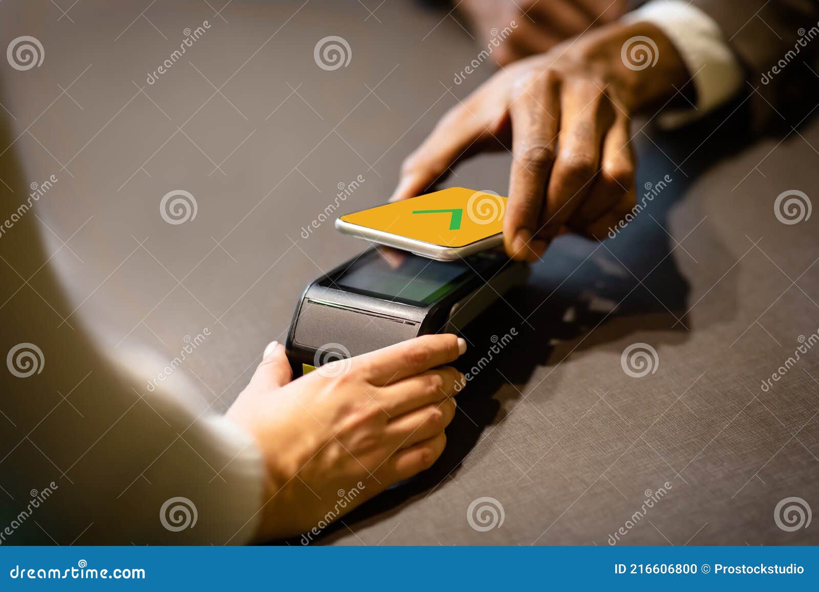 Black Man Placing Smartphone on POS Machine, Paying for Goods Stock ...