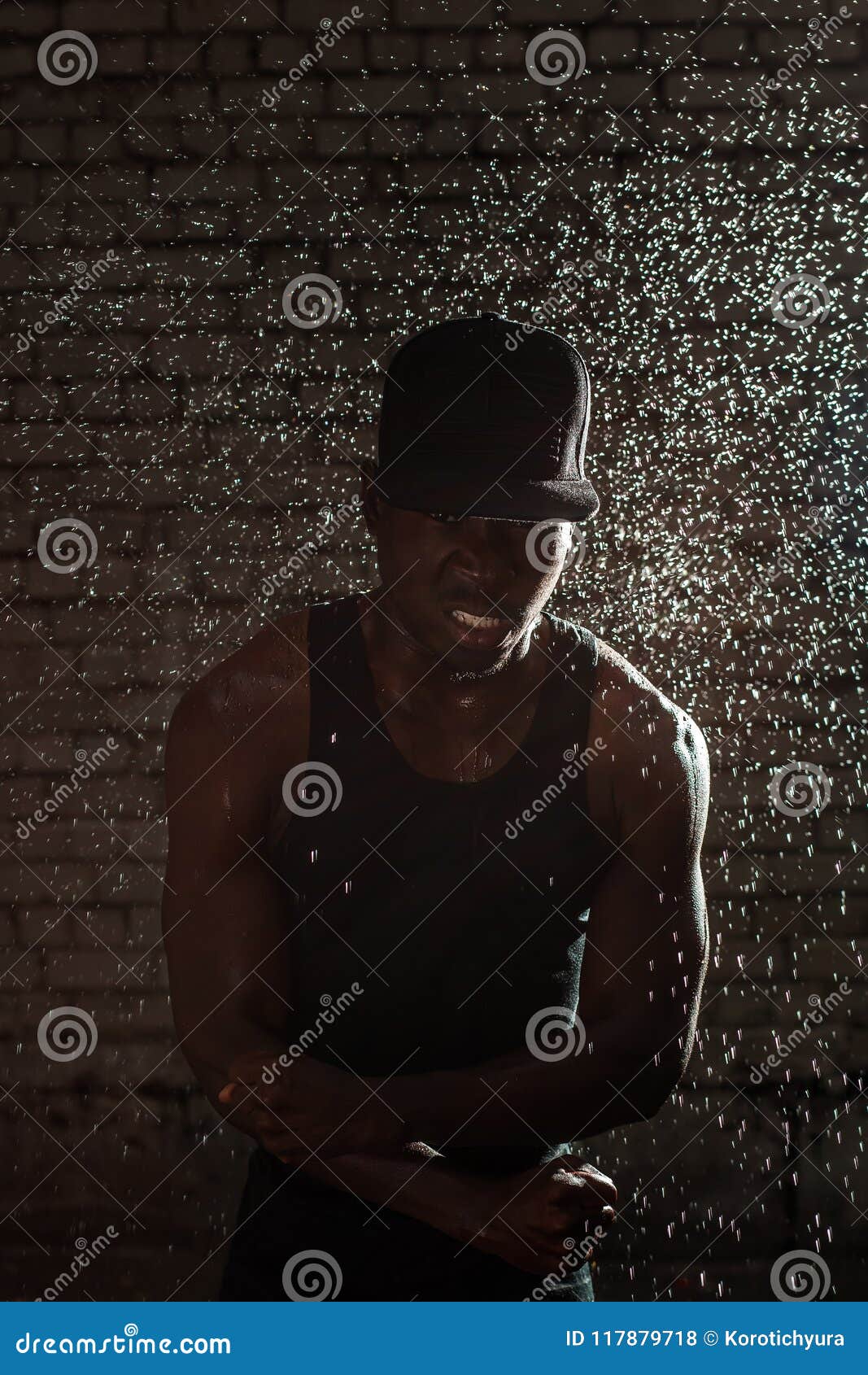 Black Man in the Rain on the Wall Background Stock Photo - Image of ...