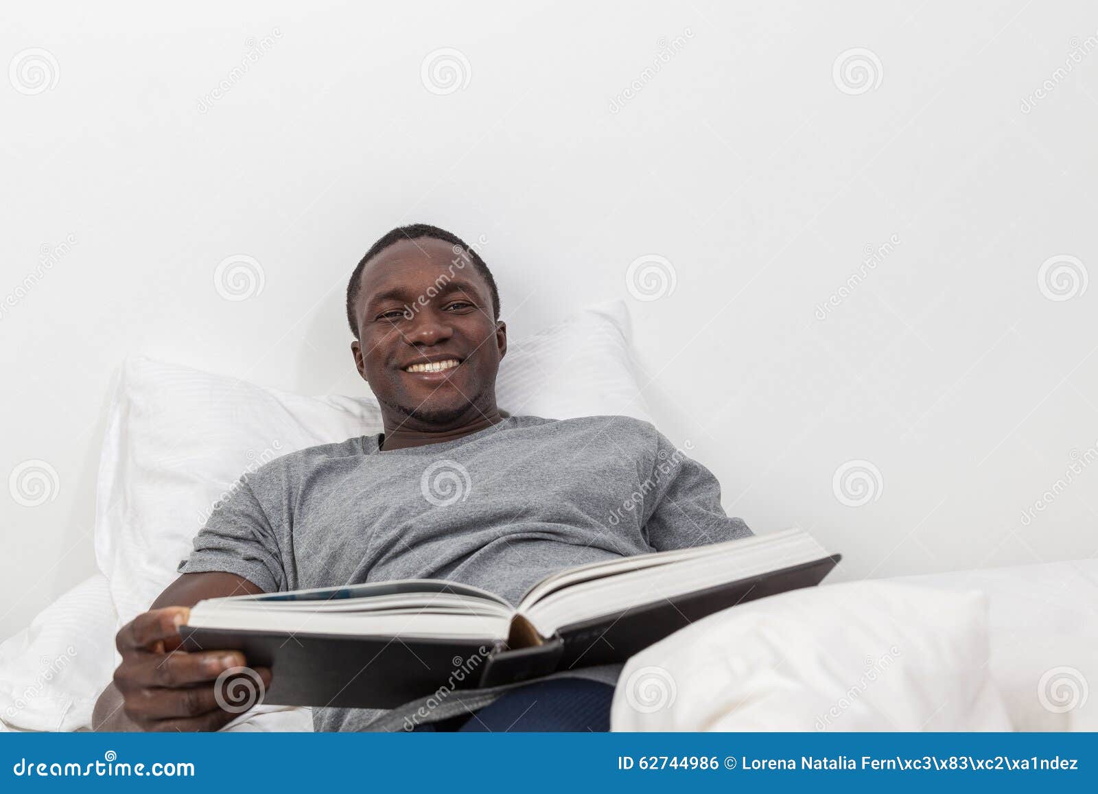 Black man reading a book stock photo. Image of black - 62744986