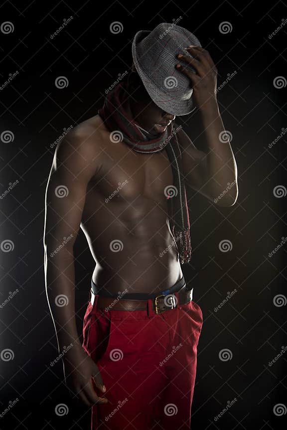 Black man removing his hat stock photo. Image of beauty - 27438166