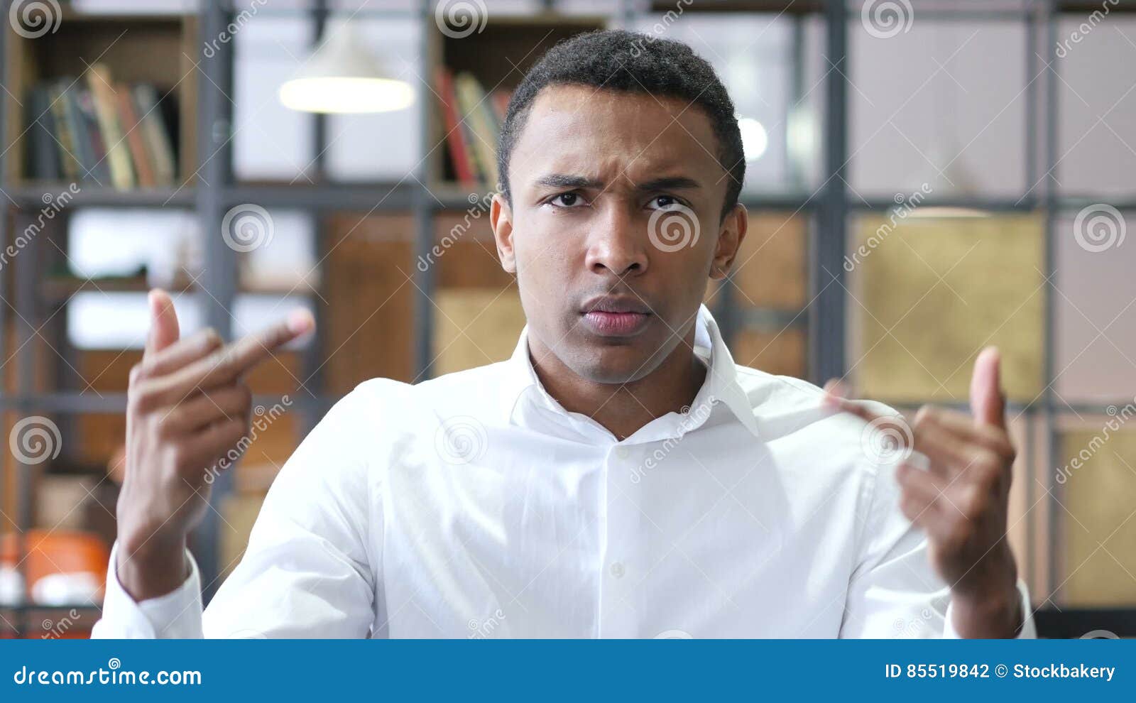 Black Man Showing Middle Finger in Office Stock Footage - Video of ...