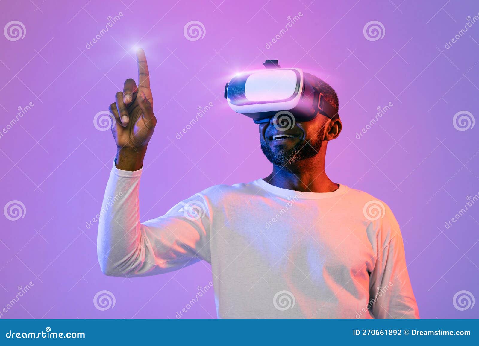 Black Man in VR Headset Touching Something Invisible Stock Photo ...