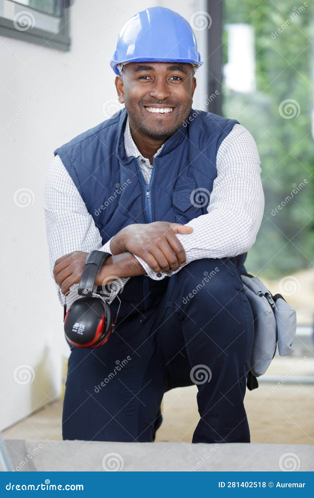 Black Man Wearing Hard-hat at Construction Site Stock Photo - Image of ...