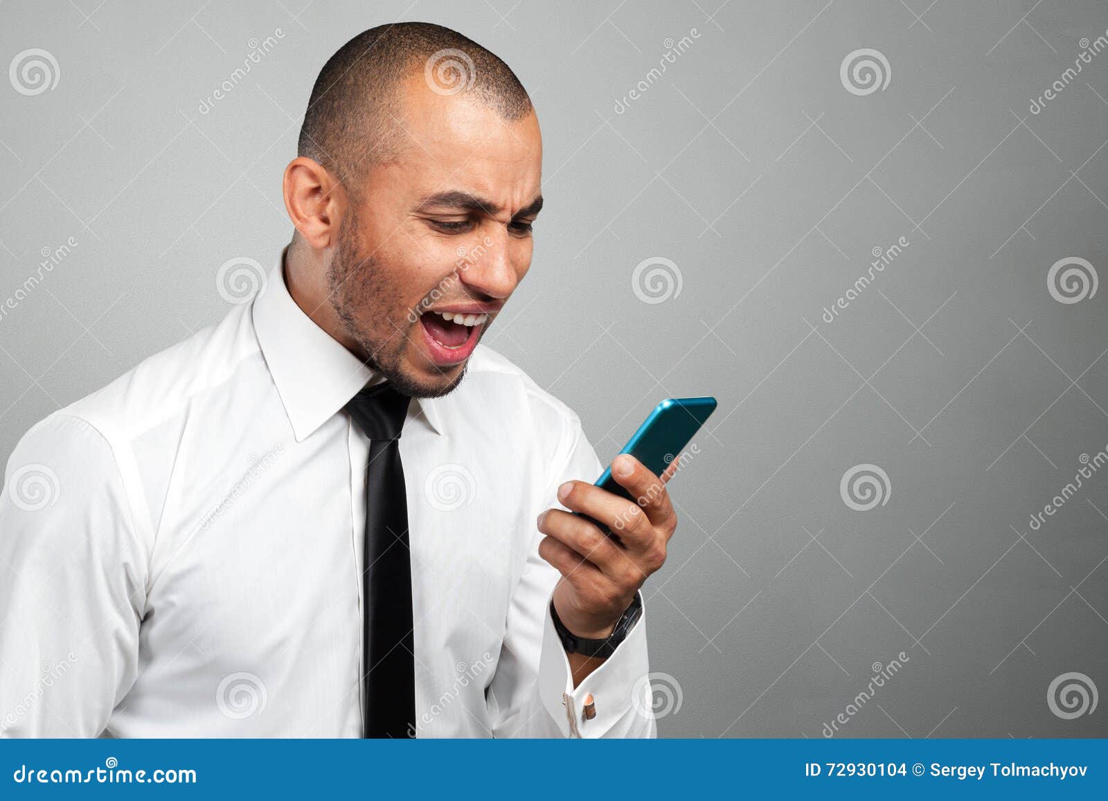 Black Man Yelling at the Cellphone Stock Photo - Image of negative ...