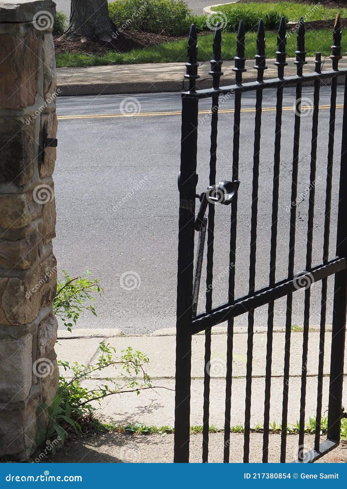 The Black Metal Gate is Partially Open. Stock Photo - Image of black ...