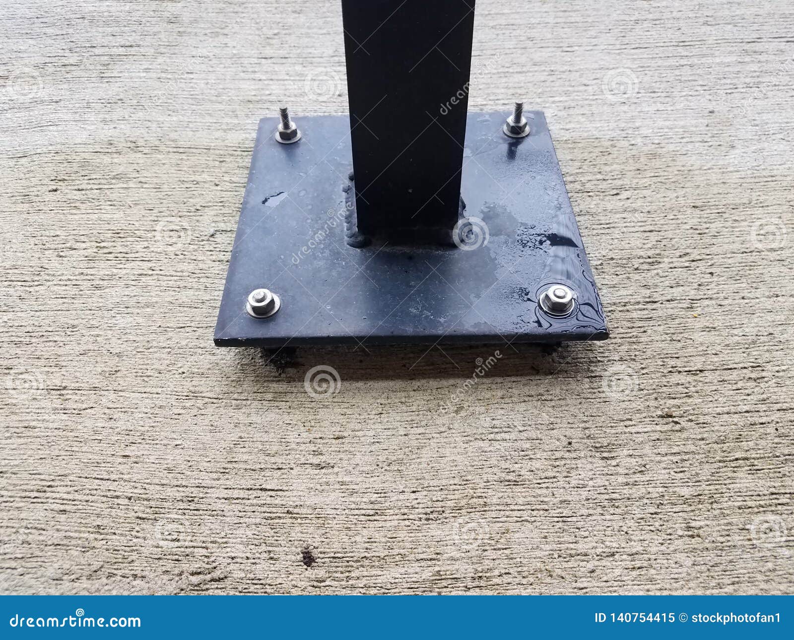Black Metal Post with Screws on Grey Cement Stock Image - Image of ...