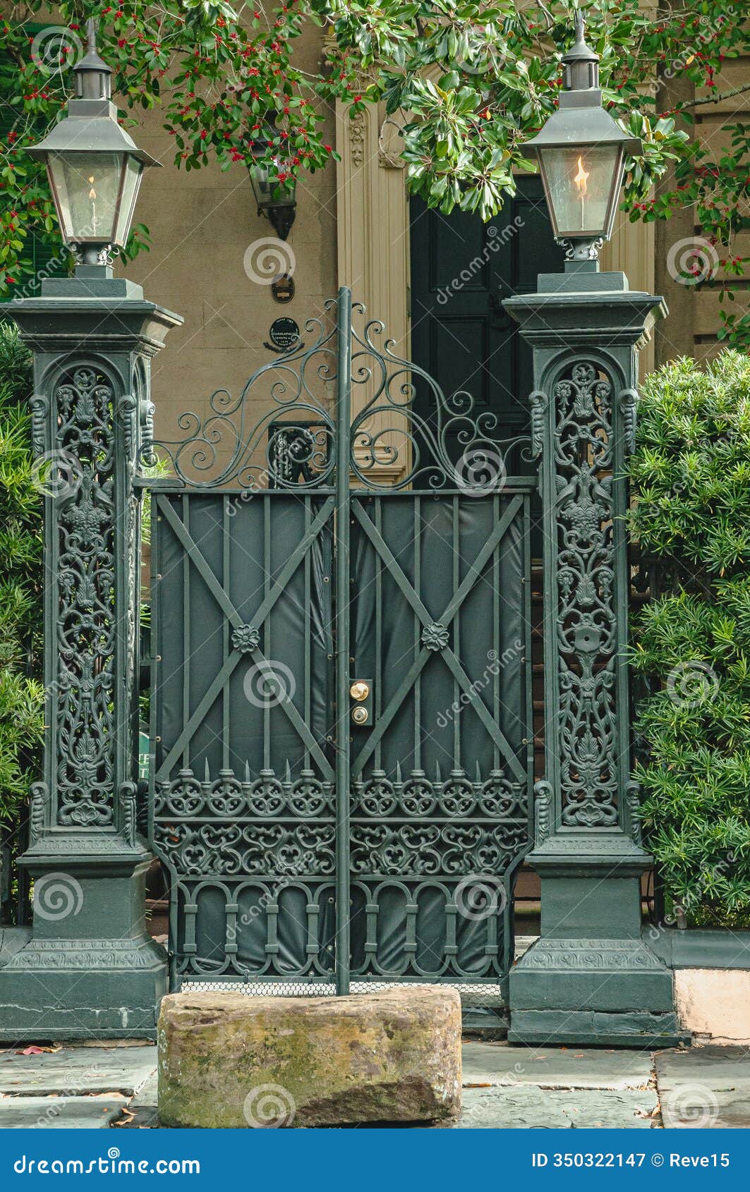 Black Metal Posts with Gas Lights and Gates with Canvas Sheets Stock ...