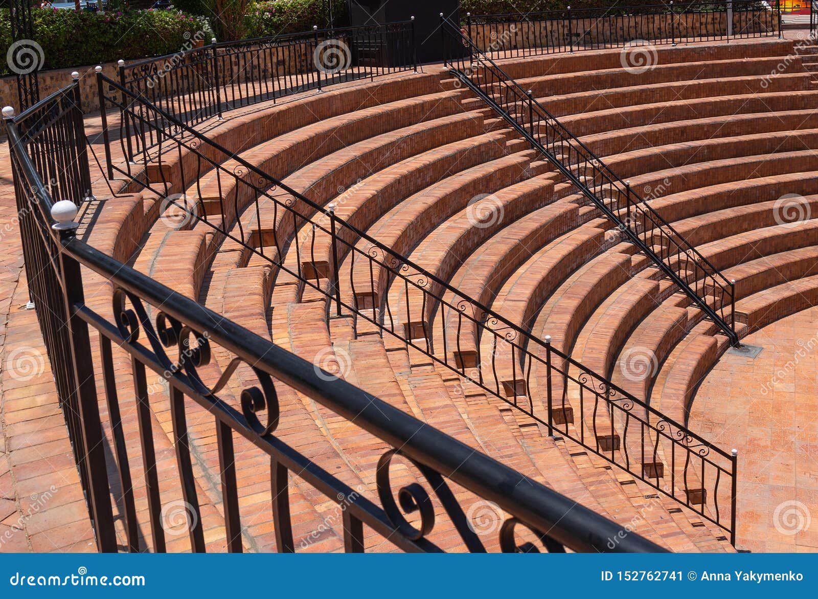 Black Metal Railings Against the Brick Steps of the Amphitheater Down ...