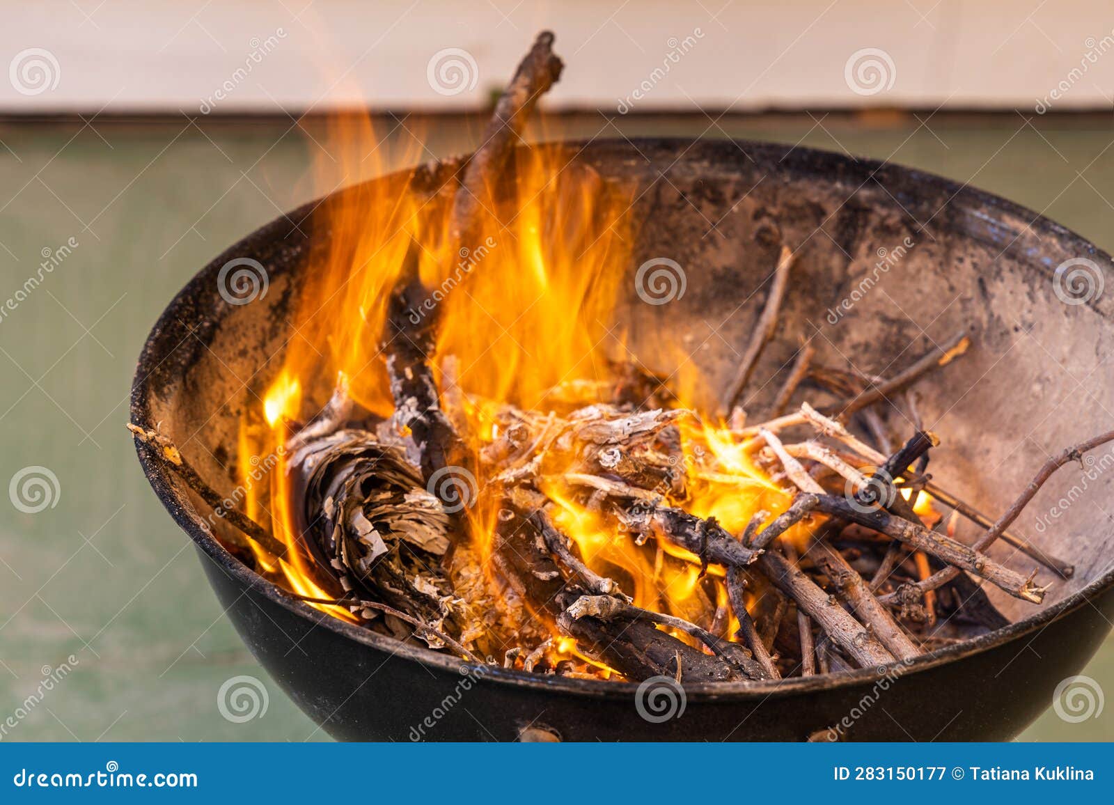 Black Metal Round Barbeque with Fire for a Picnic is in the Terrace ...