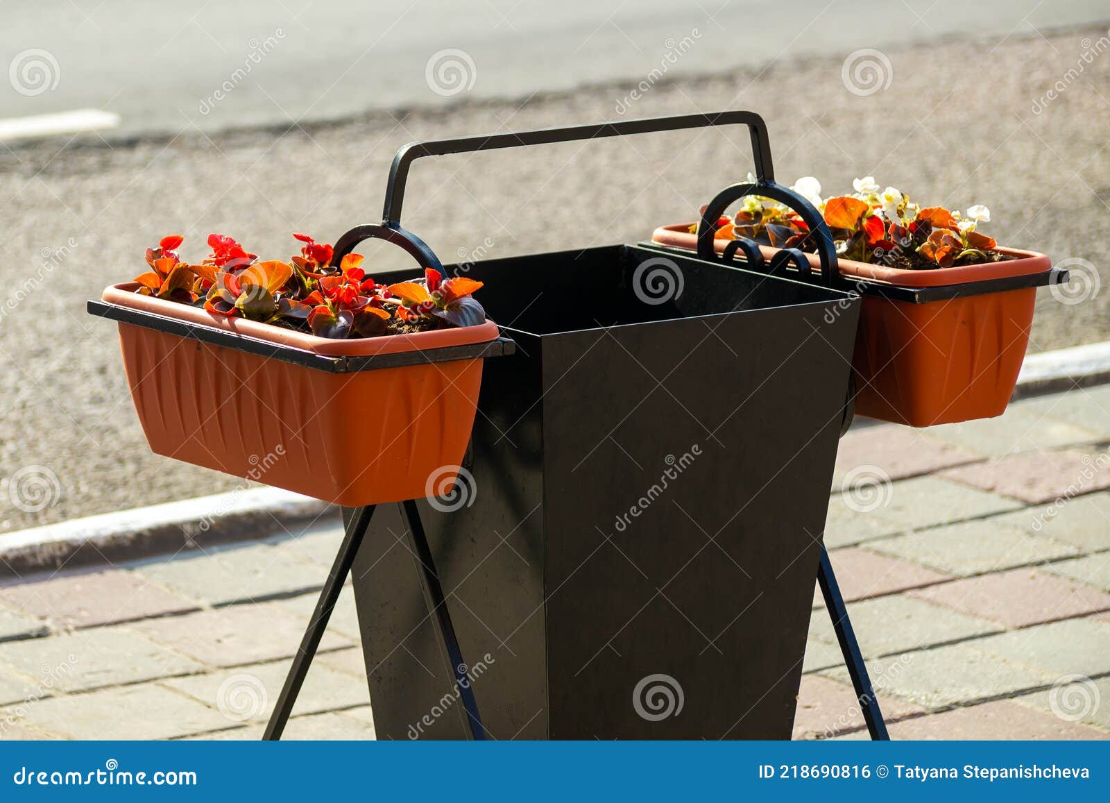 Black Metal Trash Can with Attached Rectangular Flower Pots Stock Photo ...
